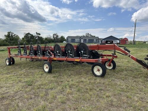 Hi-capacity rake. H & S 5114. 16 wheel v-rake. Call 701.307.0516 ...