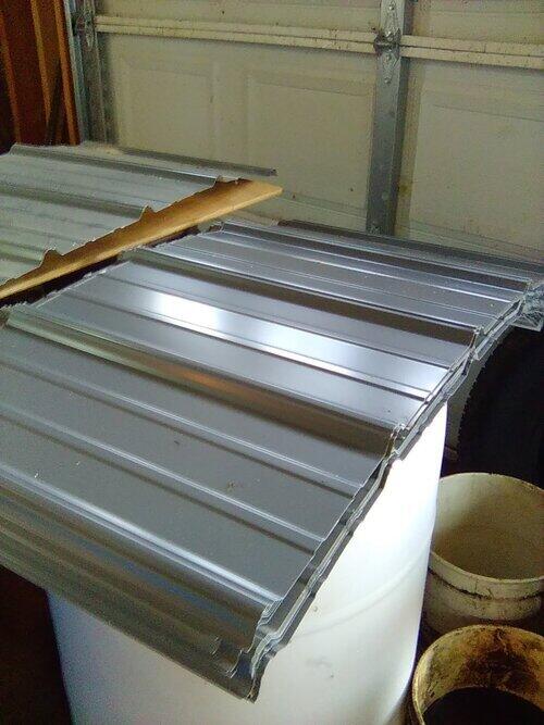 30+ sheets of 20 inch gray pro rib panels and 6 sticks of 12 ft starter ...