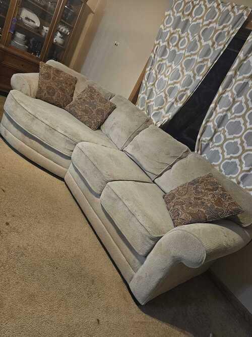 Sofa w/ cuddler corner, 120"x52" at widest points. Sand/beige color ...