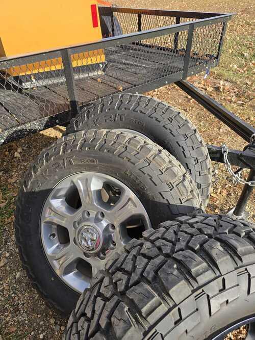 Set of aluminum wheels with new tires. Fits Ram 2500 etc.No damage ...