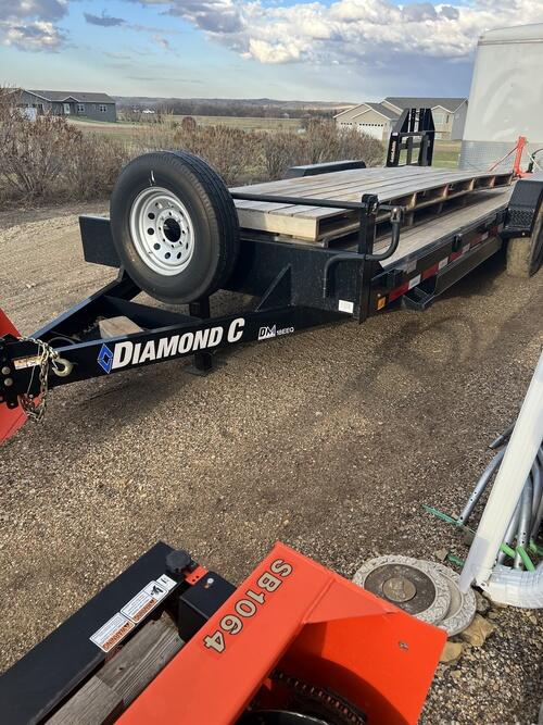 For sale is a Diamond C 20X82 skid steer trailer, 7500# axles with ...