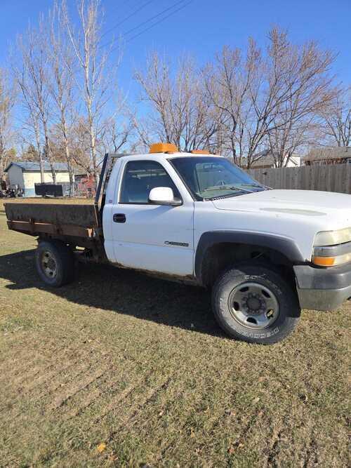 2001 Chevy 2500 Silverado 4x4 128,000 miles on odometer. Tilt bed. 8.1 ...
