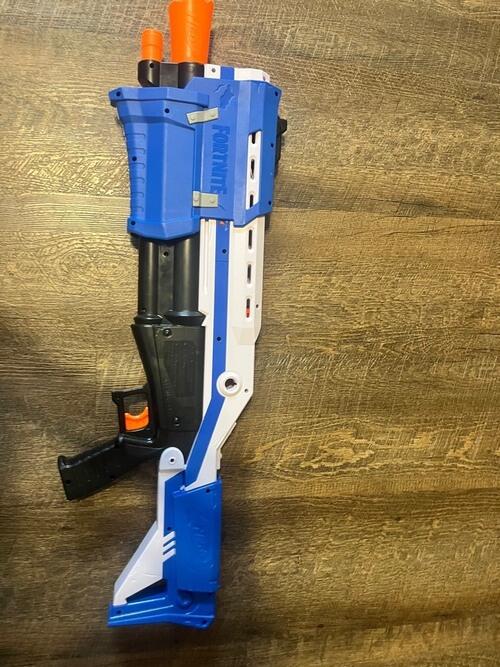 Two red one blue Fortnite blasters $10 each except one red is missing a ...